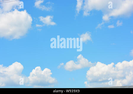 Colorful heavenly angelic white clouds and blue, blue sky with sunlight ...