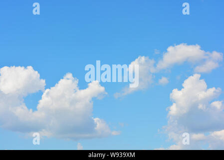 Colorful heavenly angelic white clouds and blue, blue sky with sunlight ...