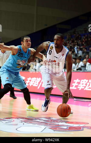 Gilbert Arenas of the Shanghai Sharks, right, celebrates with teammate ...