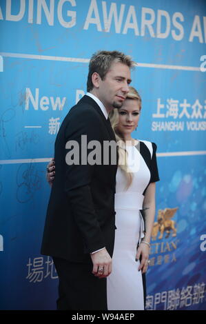 Avril Lavigne arrives on the red carpet for the Juno Awards in Edmonton ...