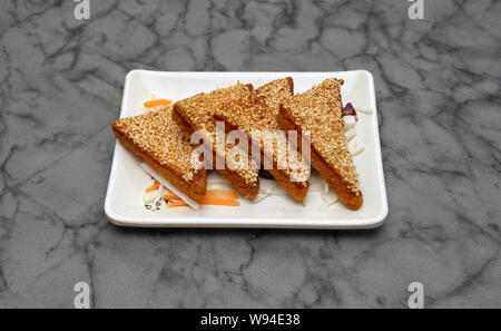 Chinese food. sesame prawn toast Stock Photo - Alamy