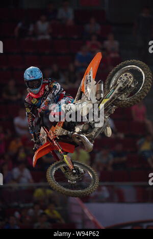 A rider performs and competes during the NIGHT of the JUMPs freestyle ...