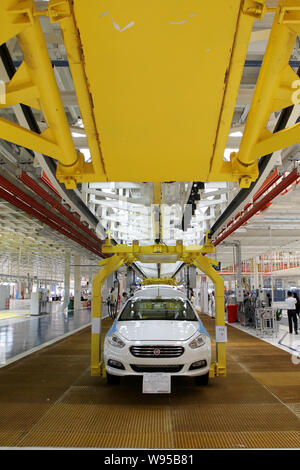 Fiat Viaggio cars pass through the assembly line at the GAC Fiat WCM ...