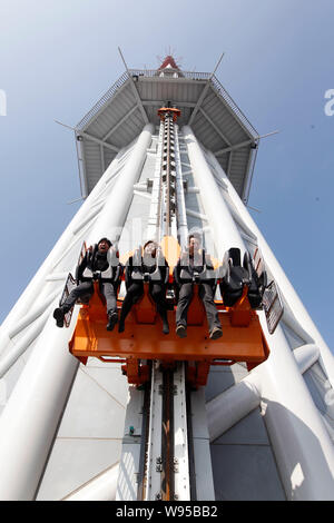 Visitors experience the worlds highest jumping machine which just ...