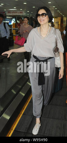 Taiwanese actress Brigitte Lin Ching-hsia arrives at the Taiwan Taoyuan ...