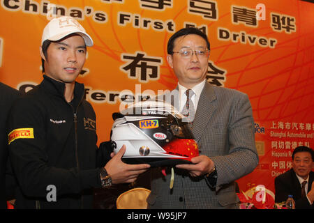 Chinese F1 driver Ma Qinghua poses at a press conference of HRT in ...