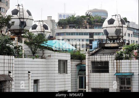 Football-shaped water tanks supplying tap water are pictured on the ...