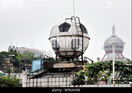 Football-shaped water tanks supplying tap water are pictured on the ...