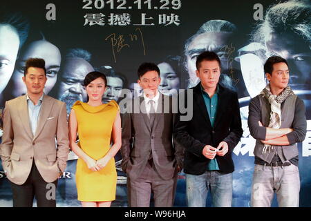Chinese actor Sha Yi, right, and his actress wife Hu Ke pose on the red ...
