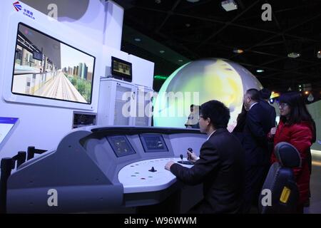 Visitors experience a new innovation item during Zhangjiang Innoparks ...