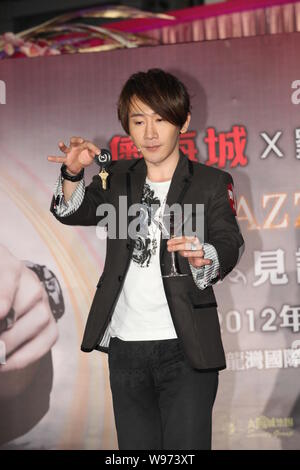 Taiwanese magician Lu Chen (Louis Liu) performs magic at Olympian City ...