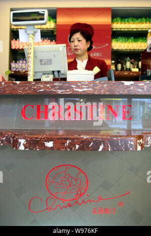 A Chinese employee works at a Christine chain bakery in Shanghai, China ...