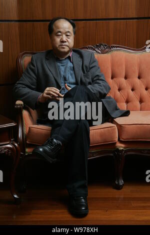 --FILE--Chinese author and writer Mo Yan visits the Port of Qingdao in ...