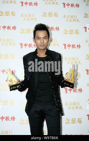 Hong Kong actor and singer Wallace Chung attends an activity in Beijing ...