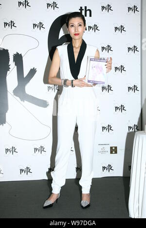 Hong Kong actress Michelle Monique Reis (R) and actor Aaron Kwok (L ...