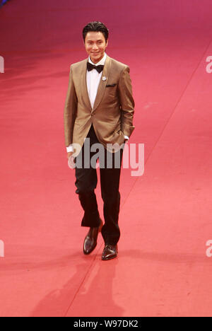 Chinese actor Chen Kun is pictured on the red carpet prior to the Men ...