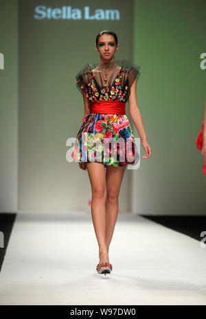 A model displays a new creation at the Stella Mccartney fashion show ...