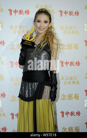 Malaysian singer Penny Tai poses during a year-end dinner party by Seed ...