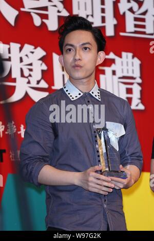 Taiwanese singer A-Lin poses with her trophy at the KKBox Music Awards ...