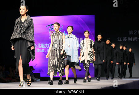 Models parade to show the new creations in the Taipei IN Style fashion ...