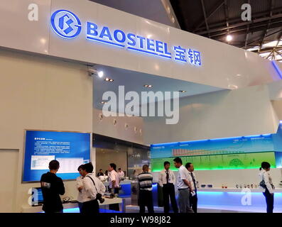 --File--Visitors are seen at the stand of Baosteel during a fair in ...