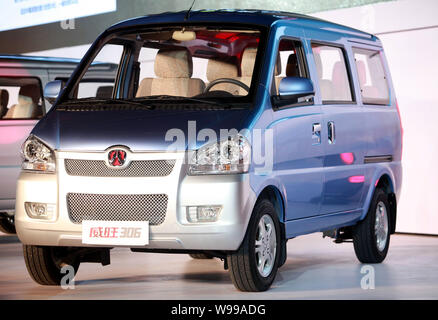 The BAIC Weiwang 306 minivans are pictured during a launch ceremony in ...