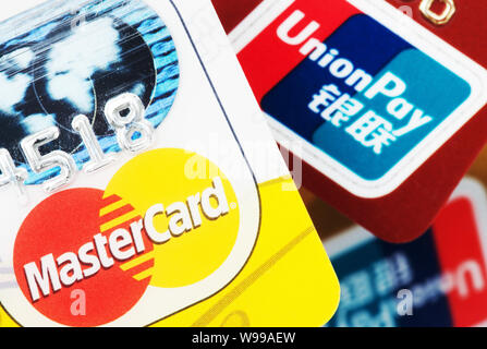 --FILE--Credit cards with logos of China UnionPay and MasterCard are ...