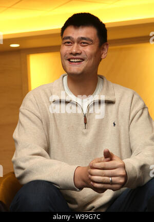 Retired Chinese basketball player Yao Ming is pictured during a CBA ...