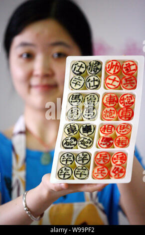 pieces of chinese moon cake in white plate Stock Photo - Alamy