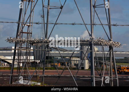 Anti-climb protection on electricity pole Stock Photo - Alamy