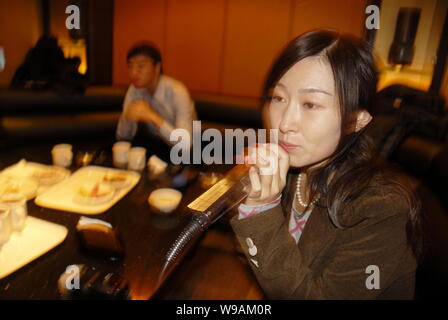 Chinese karaoke at a KTV in Beijing, China. 09-Nov-2009 Stock Photo - Alamy