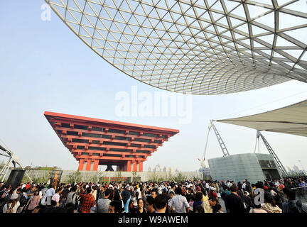 Visitors crowd the Expo Axis next to the China Pavilion in the World ...