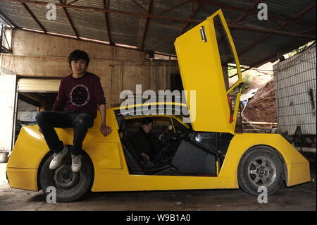 Chen Jinmiao sits on his knockoff Lamborghini by a street in Chenzhou ...