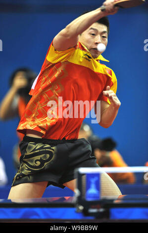 China's MA Long competes in the Final Match against FAN Zhendong at ...