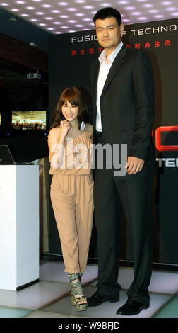 Houston Rockets' Yao Ming, right, of China, shoots over Washington ...