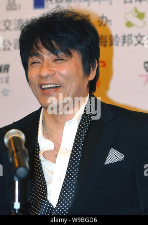 Japanese singer and songwriter Ryo Aska is seen at a press conference ...