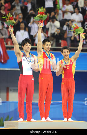 From Left, Silver medalist China's Chen Long, Gold medalist Denmark's ...