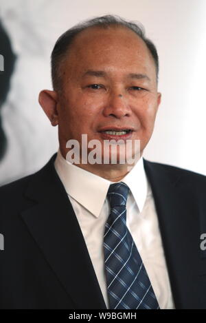 Hollywood film director John Woo is seen at a press conference for his ...