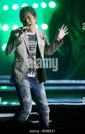 Taiwanese singer Phil Chang performs at the opening ceremony of the 2nd ...