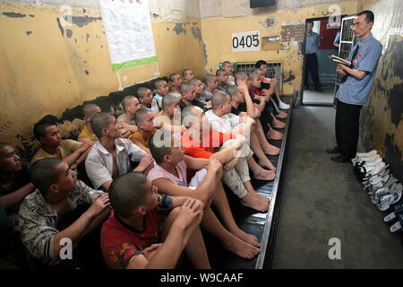 --FILE-- Prisoners are seen at a jail in Beijing, China, May 30, 2007 ...