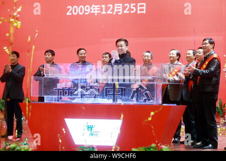 Shanghai Mayor Han Zheng, front, and other Chinese officials are seen ...