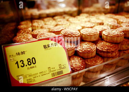Traditional Chinese cakes are seen for sale at a pushcart vendor in ...