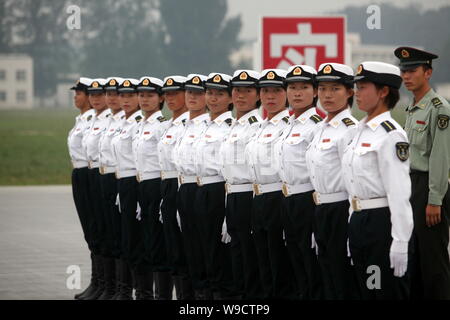 Female Chinese PLA soldiers exercise during a military parade training ...
