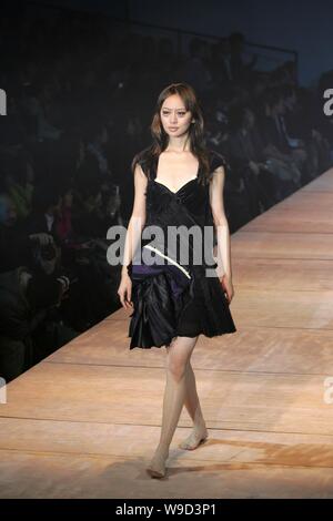 A model presents the new collection at the Mark Cheung 2010 Spring ...