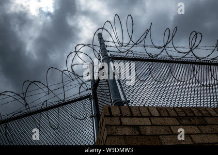 Security border fence with razor wire, Brownsville, Texas, USA Stock ...