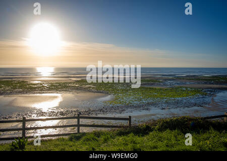 Sunrise and sunset at the beach at Laytown, Co Meath, Ireland Stock ...