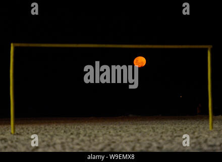 fire moon on soccer goal Stock Photo - Alamy