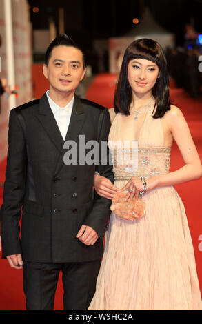 Hong Kong singer Anthony Wong poses with trophies at the press ...