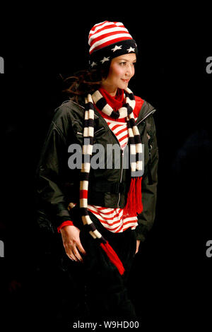 A model takes to the catwalk with a creation of the Autumn-Winter 2019 ...