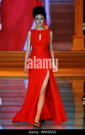 The model walks on the catwalk of the International Fashion Show ...